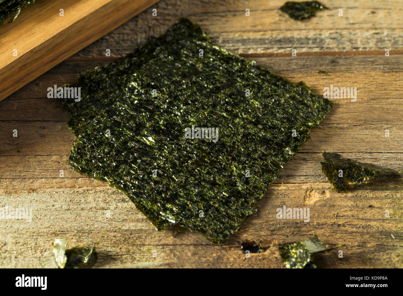Organic Green Dry Roasted Seaweed Sheets on a Board Stock Photo - Alamy