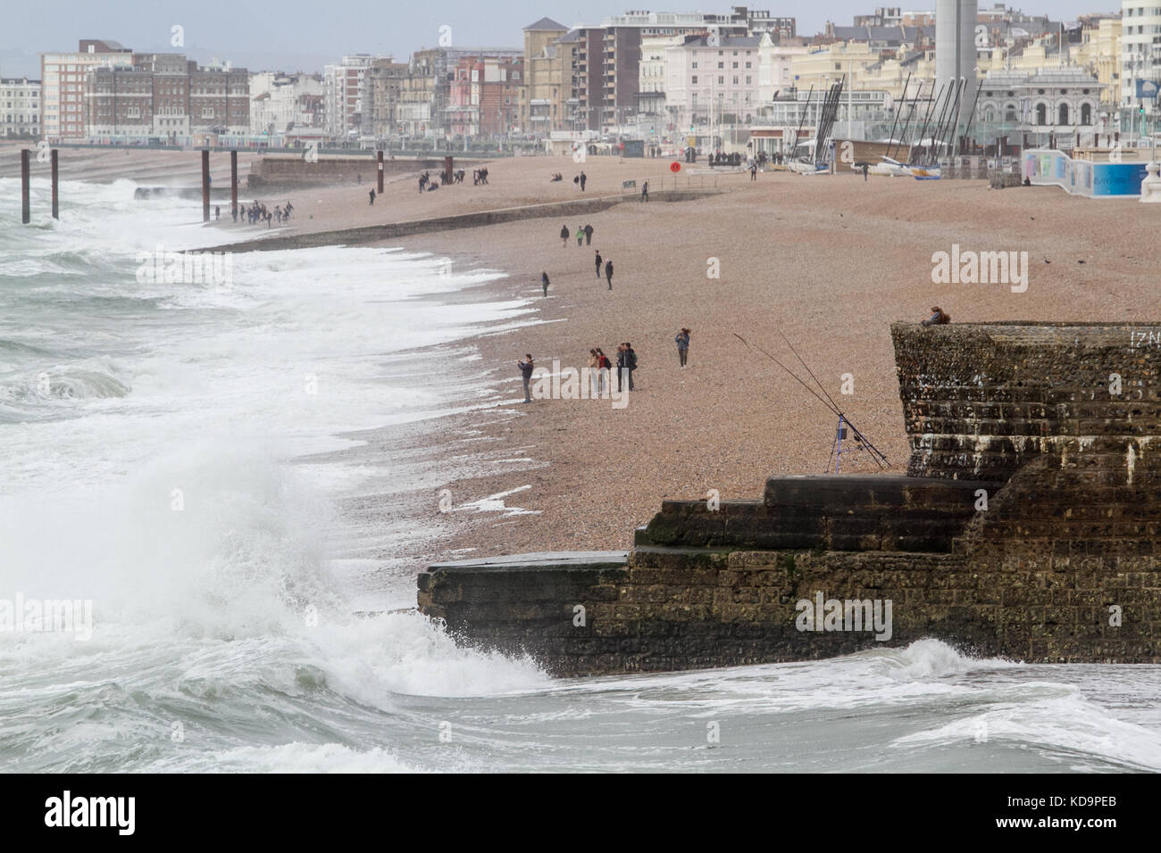 Brighton Sussex. 11th October 2017. People brave the blustery and windy ...
