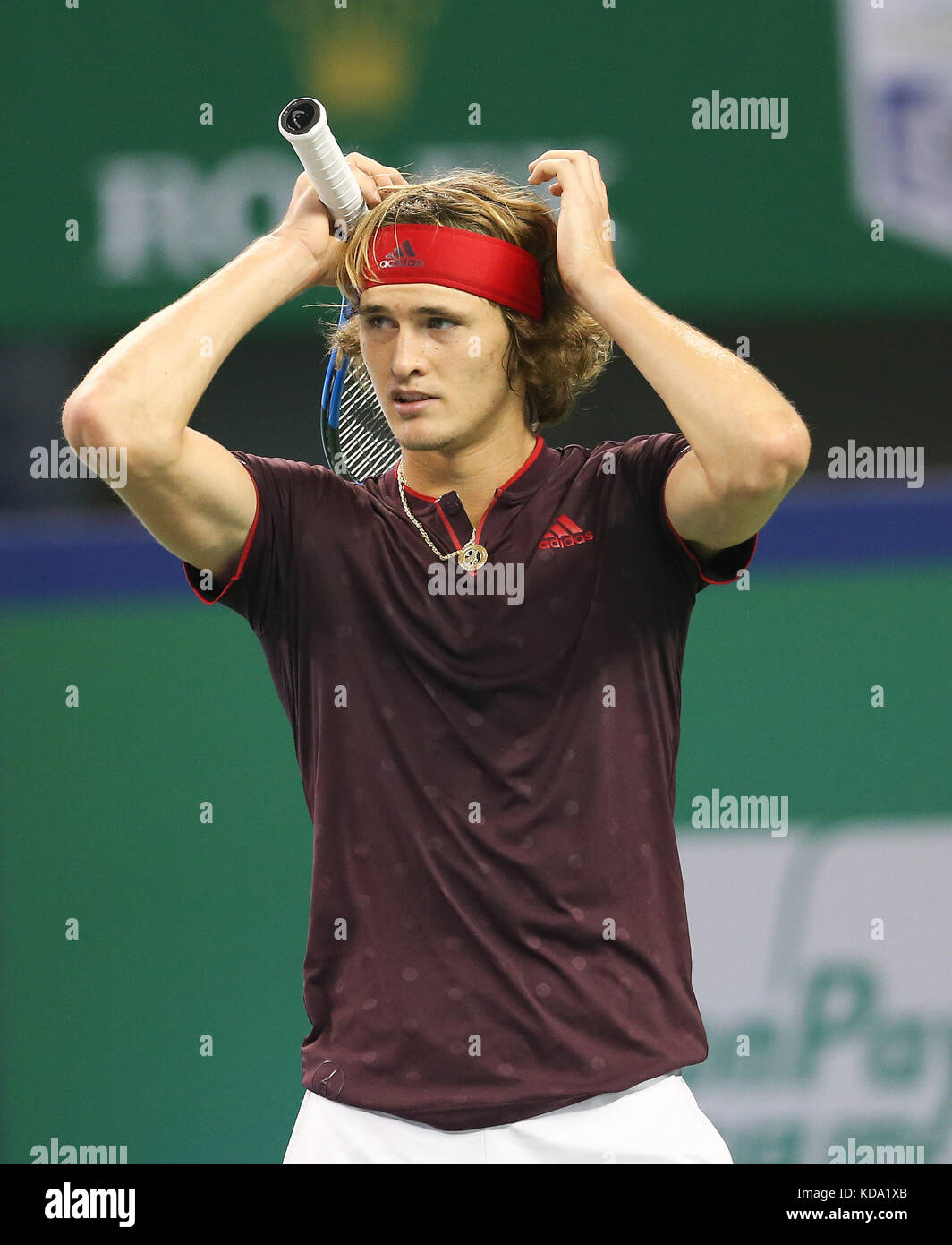 Shanghai, China. 12th Oct, 2017. Alexander Zverev of Germany reacts ...