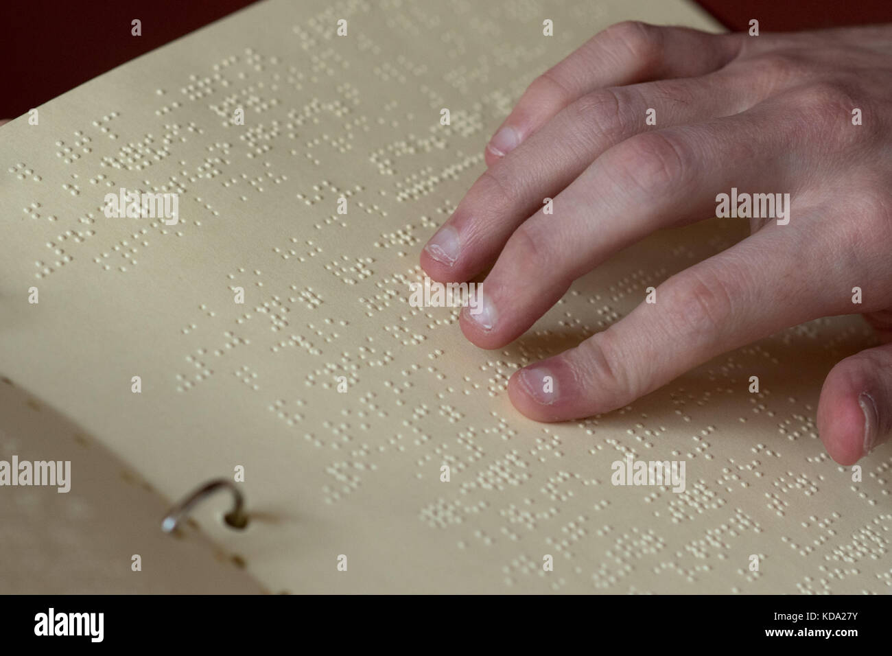 The blind honorary judge, Florian Schurbesmann, reading a statute book ...