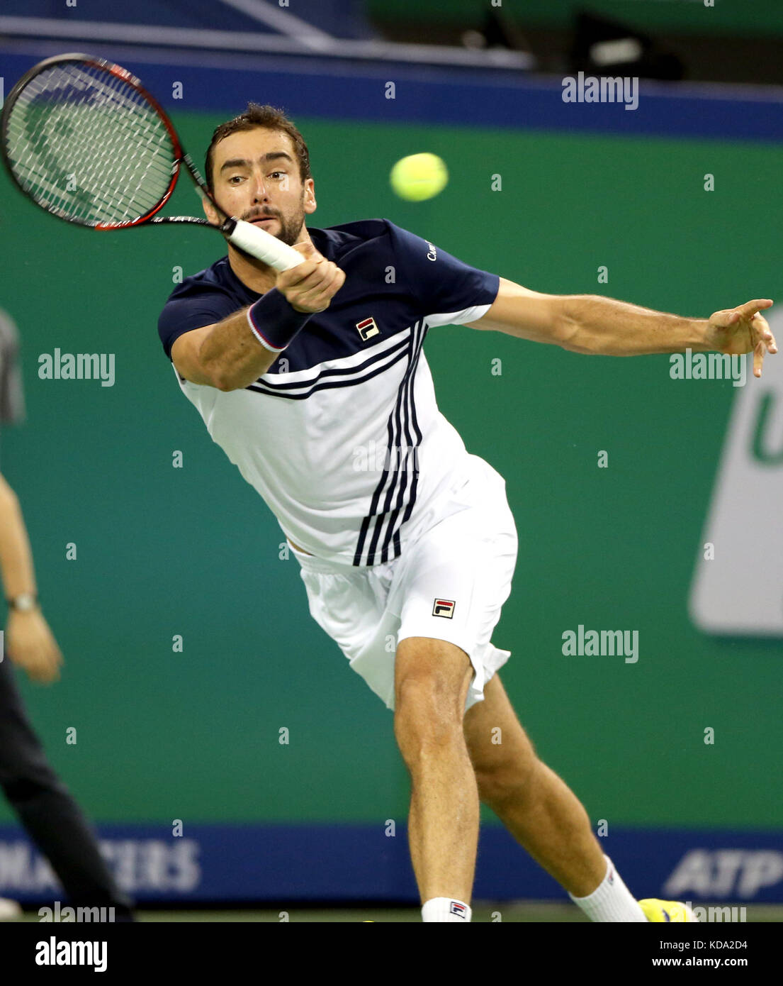 Shanghai, China. 12th Oct, 2017. Marin Cilic of Croatia returns the ...