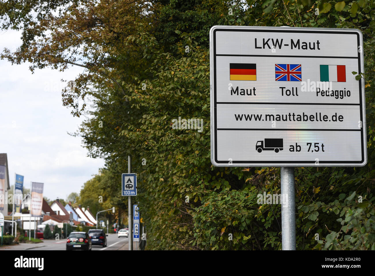 A sign warning of the toll charge for trucks pictured immediately after ...