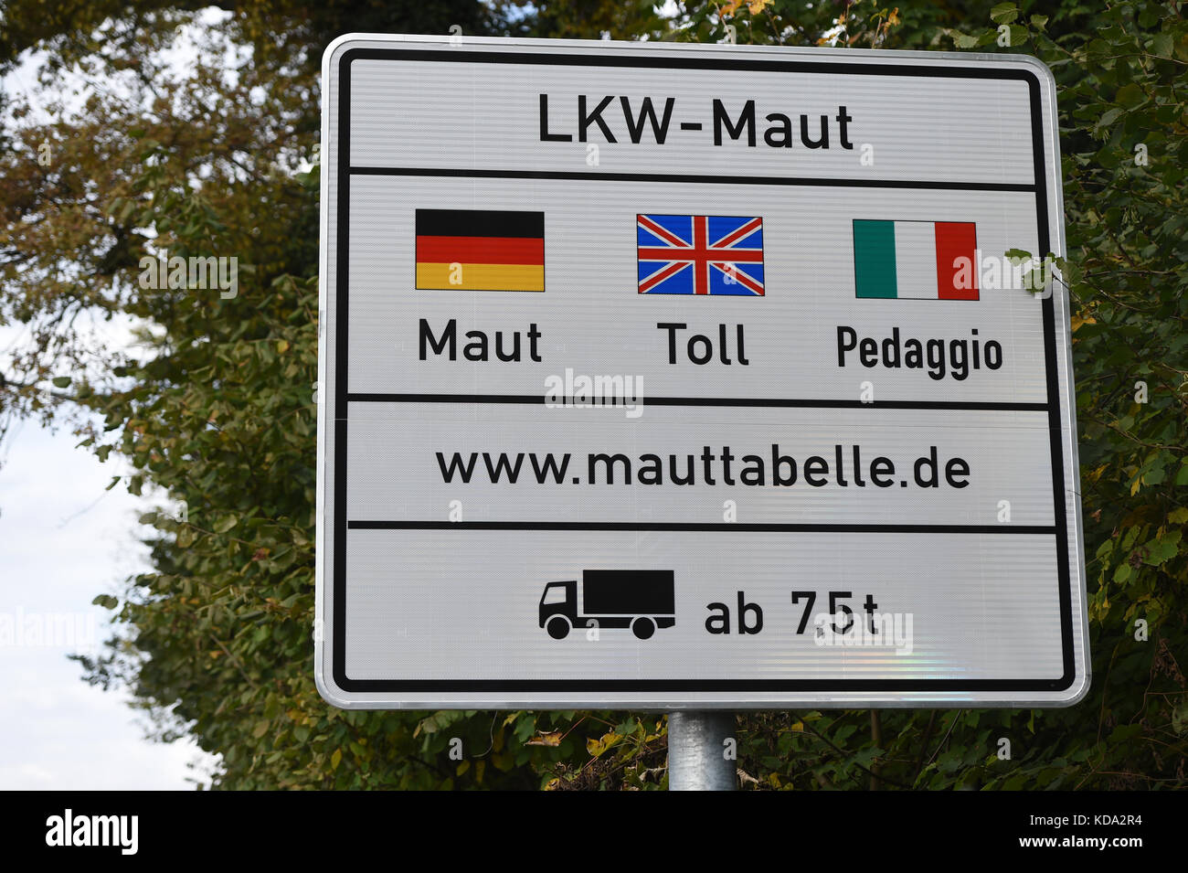 A sign warning of the toll charge for trucks pictured immediately after ...