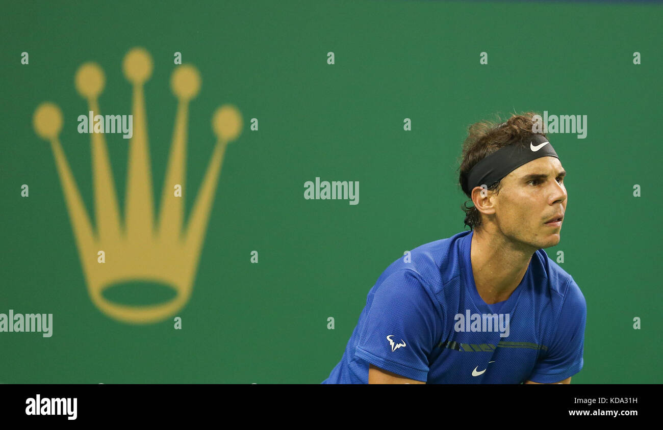 Shanghai, China. 12th Oct, 2017. Rafael Nadal of Spain reacts during ...