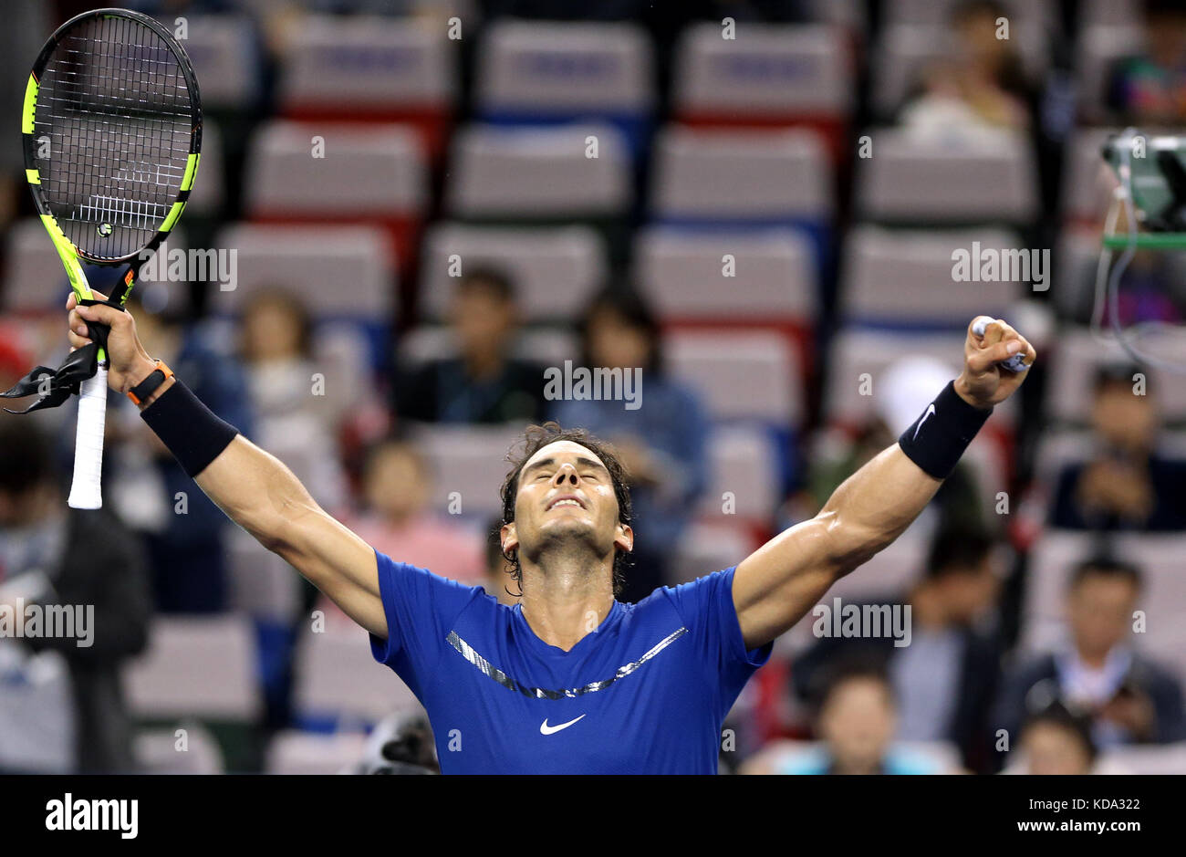 Shanghai, China. 12th Oct, 2017. Rafael Nadal of Spain celebrates after ...
