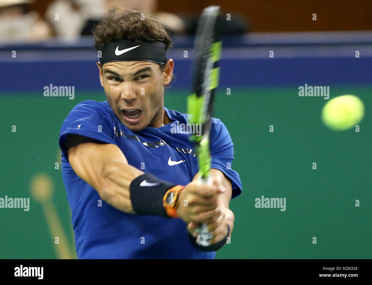 Shanghai, China. 12th Oct, 2017. Rafael Nadal of Spain hits a return ...