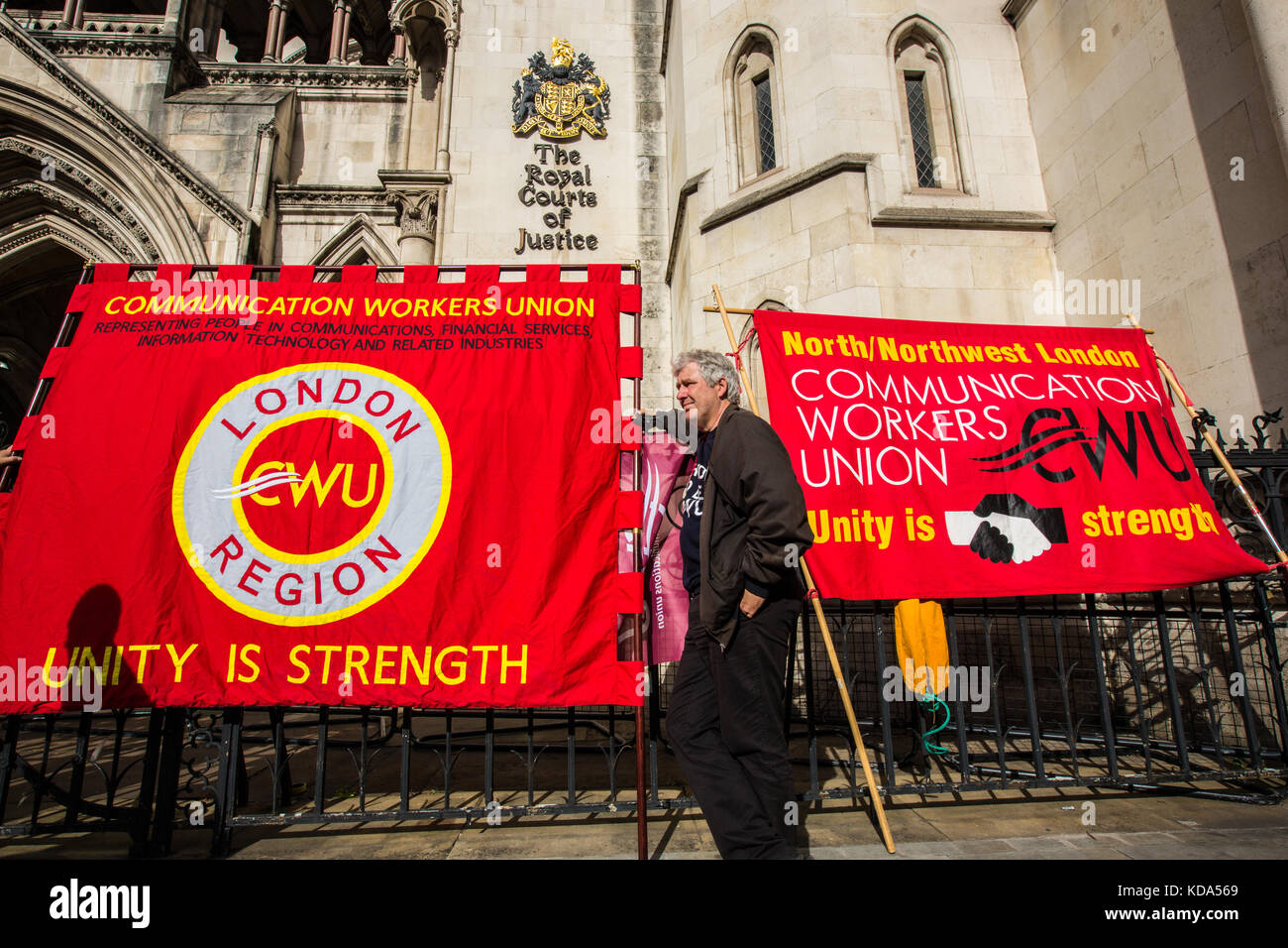 London, UK. 12 October 2017. Union banners outside of the High Court ...