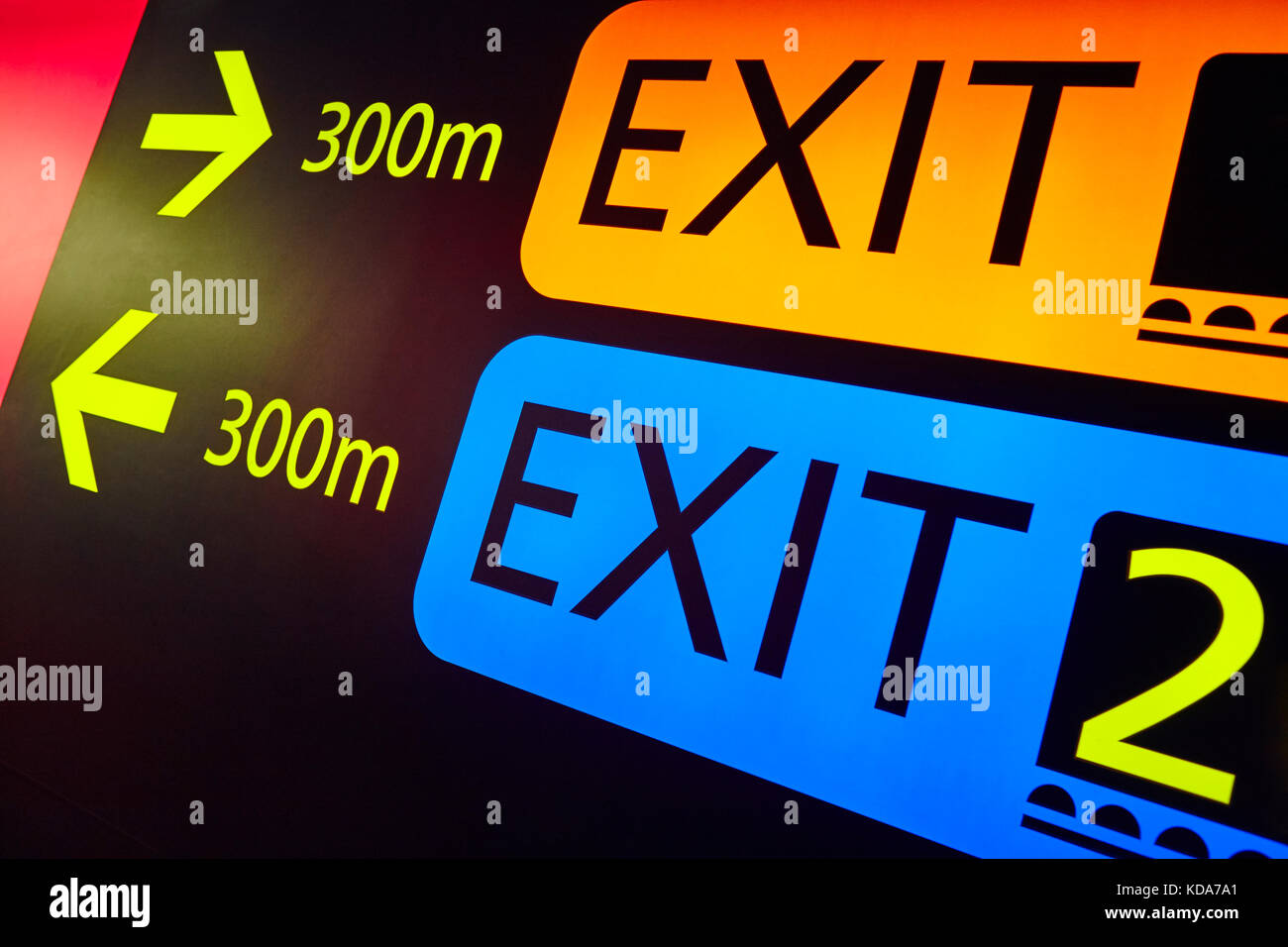 Exit information signal post at airport terminal. Travel background ...