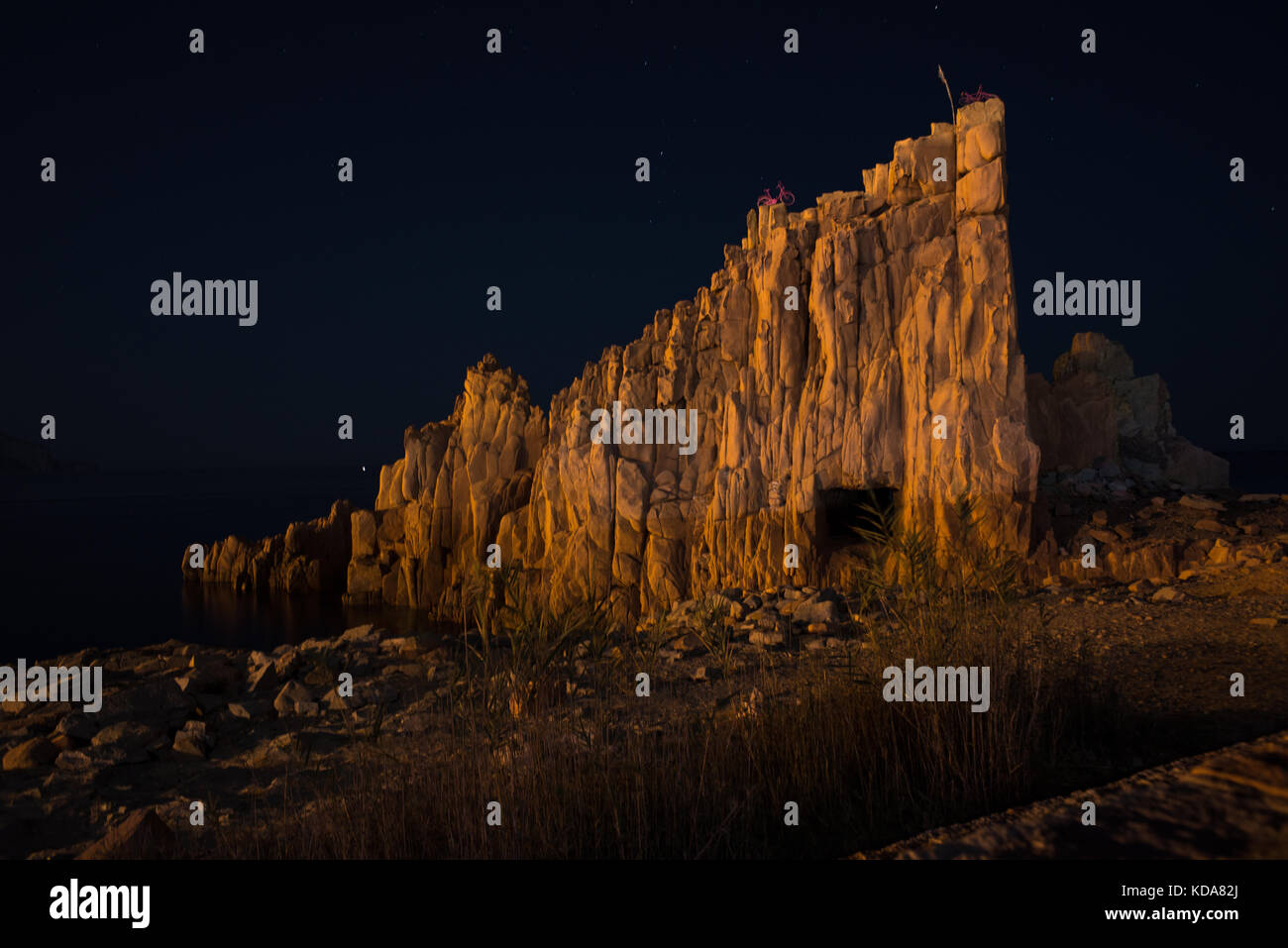 Night view of the Rocce Rosse of Arbatax in Sardinia. Arbatax Red Rocks ...