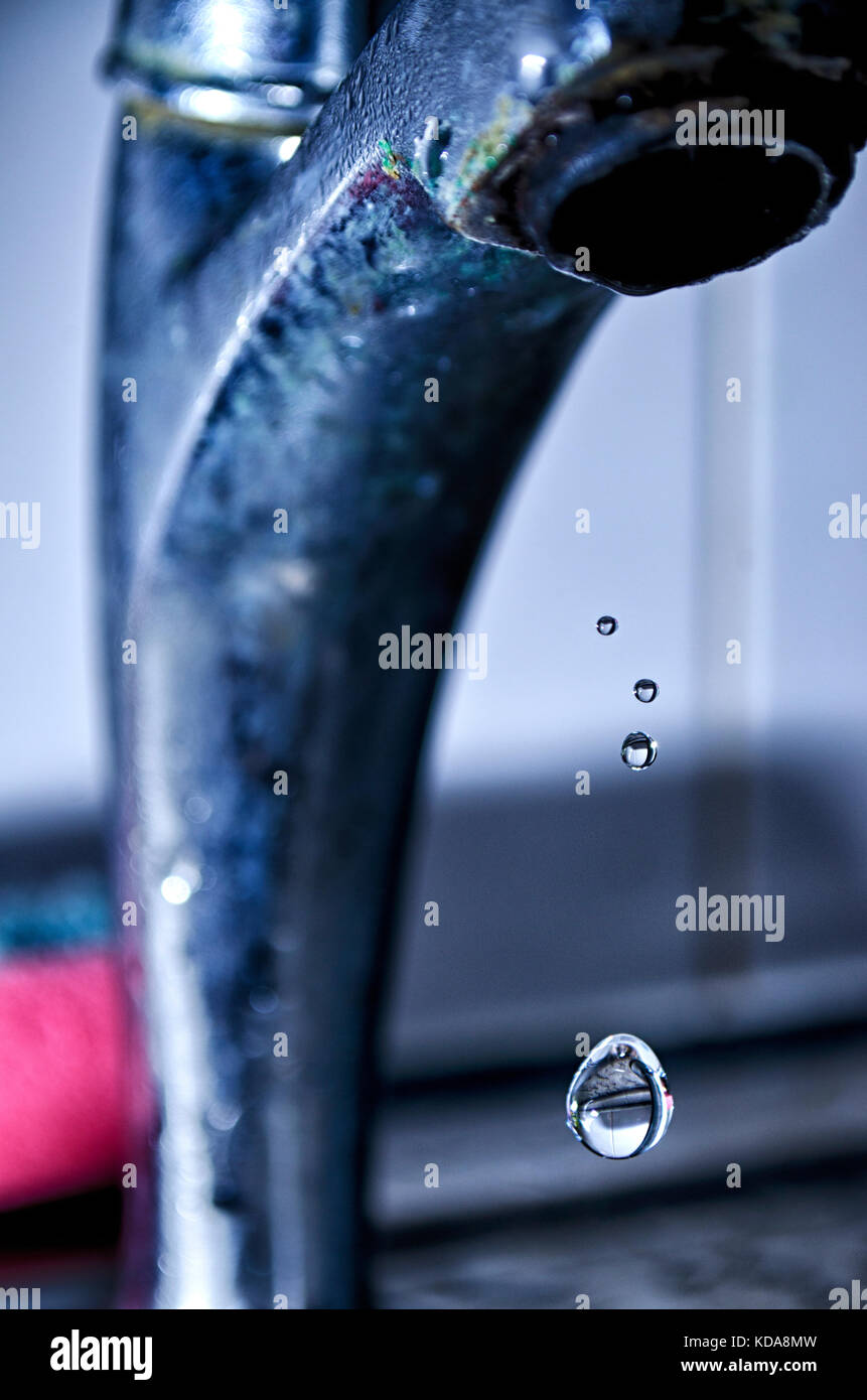 Water Dripping from Faucet Stock Photo - Alamy