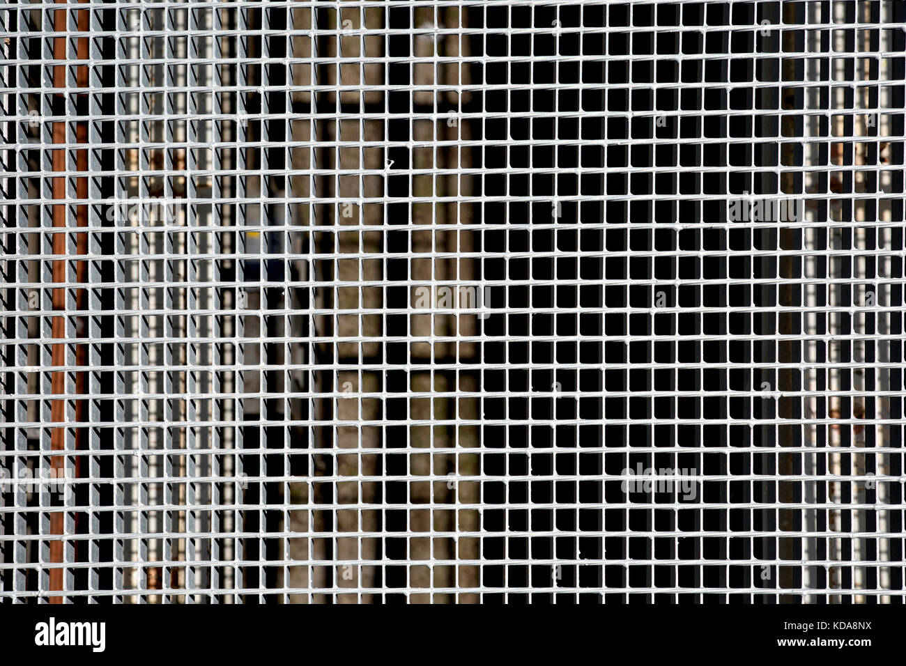 metallic grid pattern Covering the hole for safety Stock Photo - Alamy