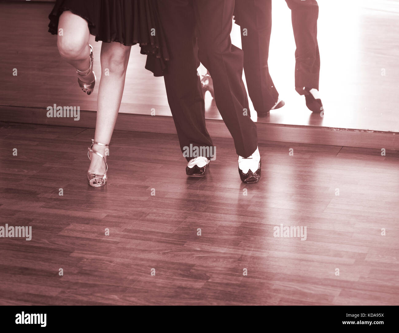 Ballroom dance couple of dancers and teachers in studio school dancing ...