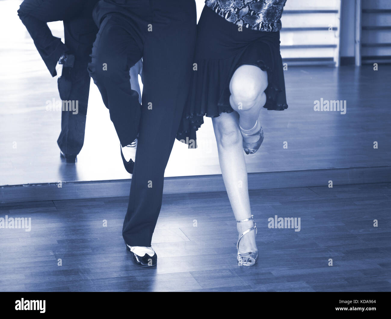 Ballroom dance couple of dancers and teachers in studio school dancing ...