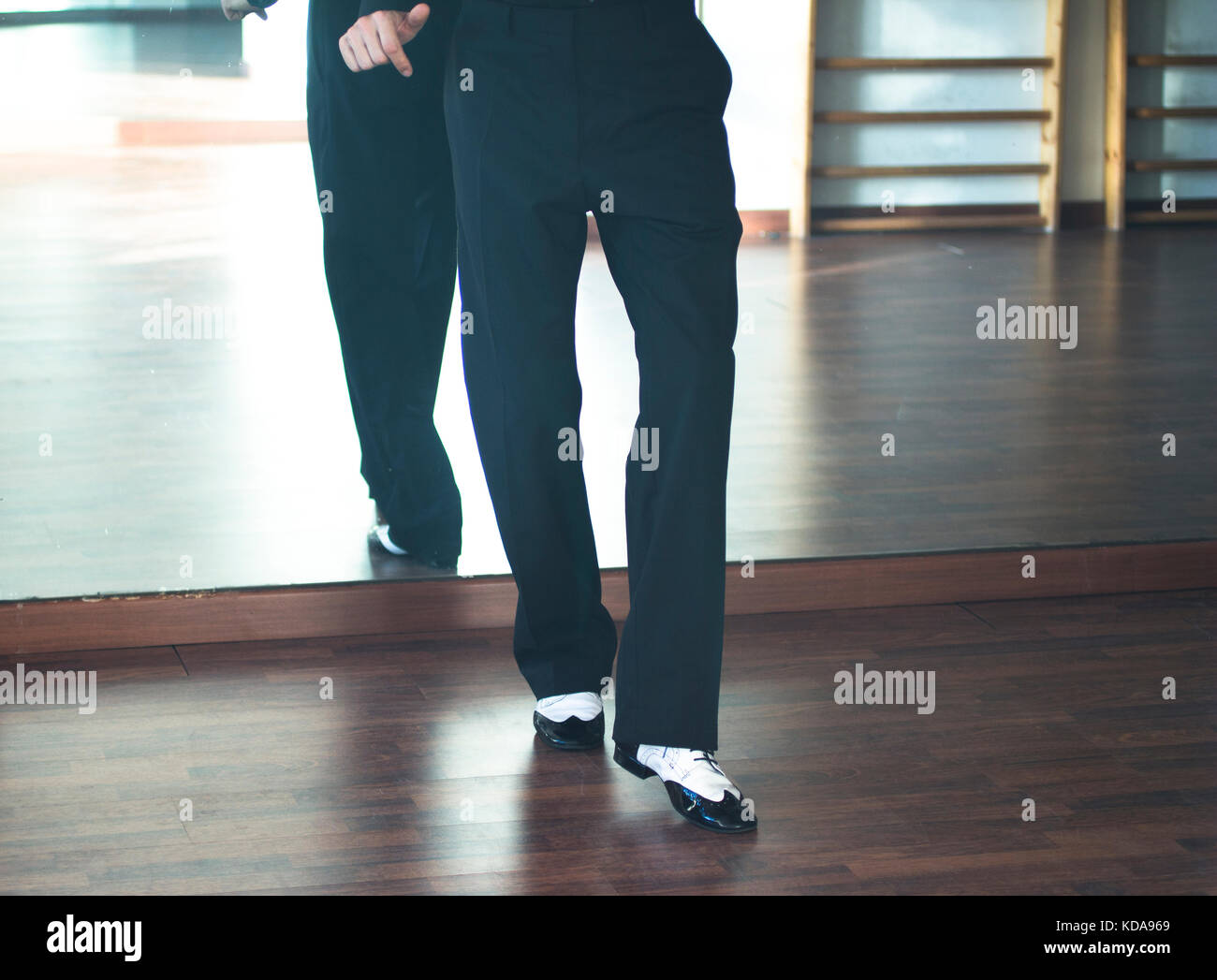 Ballroom dance male dancer and teacher in studio school dancing in ...