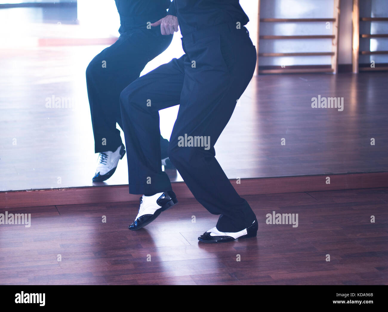 Ballroom dance male dancer and teacher in studio school dancing in ...