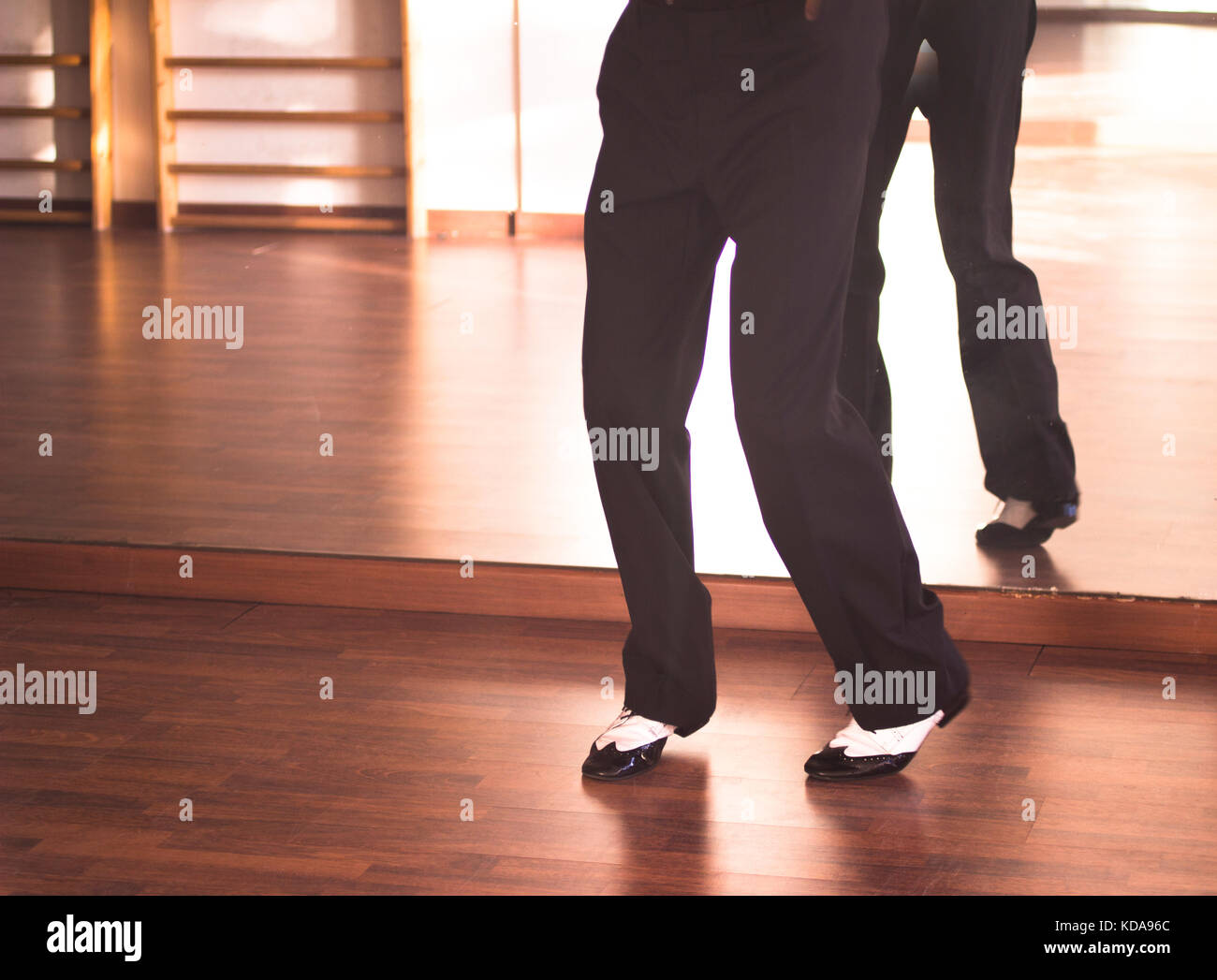 Ballroom dance male dancer and teacher in studio school dancing in ...