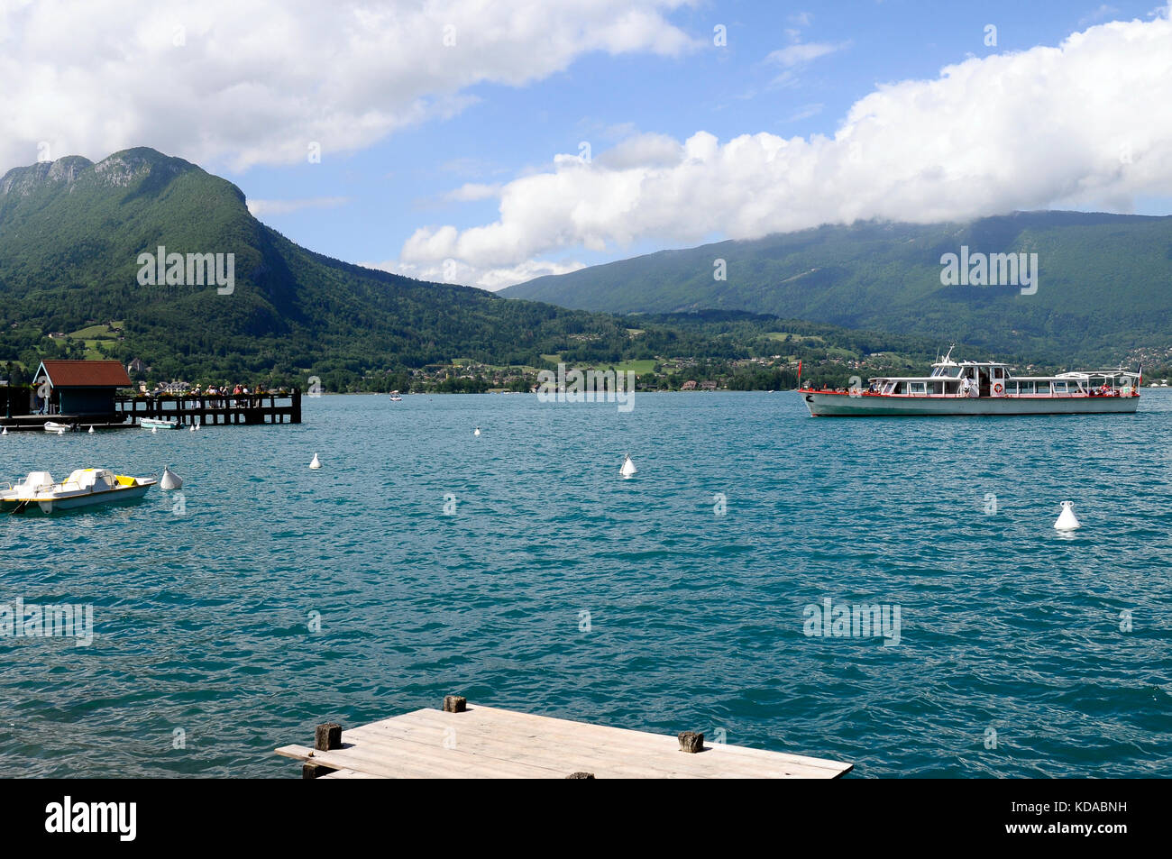Landscape of Annecy lake : tourist boat stopping at Talloires jetty ...