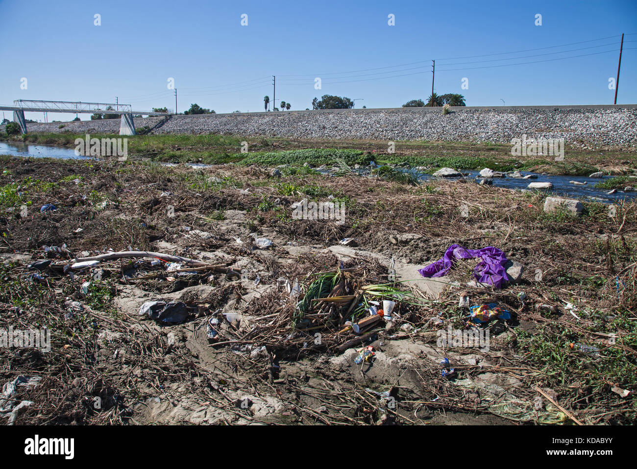 Trash strewn along Los Angeles River near WIllow Street, Long Beach ...