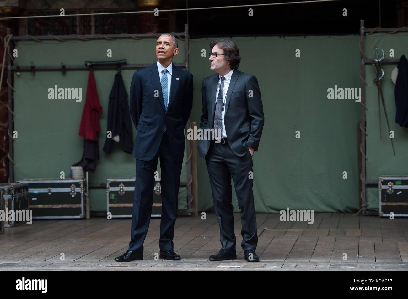 English theatre director Dominic Dromgoole gives U.S. President Barack Obama a tour of the ...
