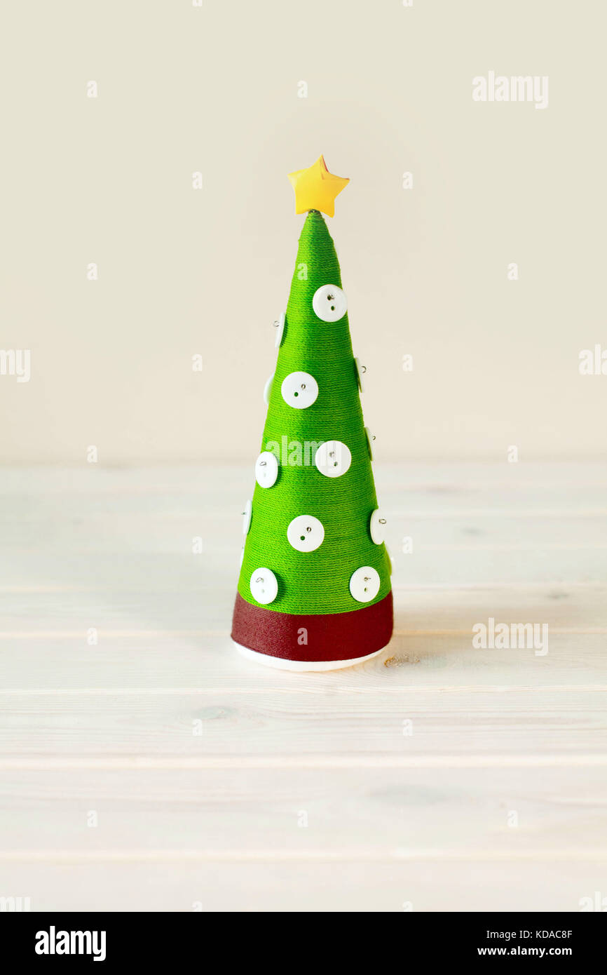 Alternative Christmas tree cones. Christmas tree made of thread and ...