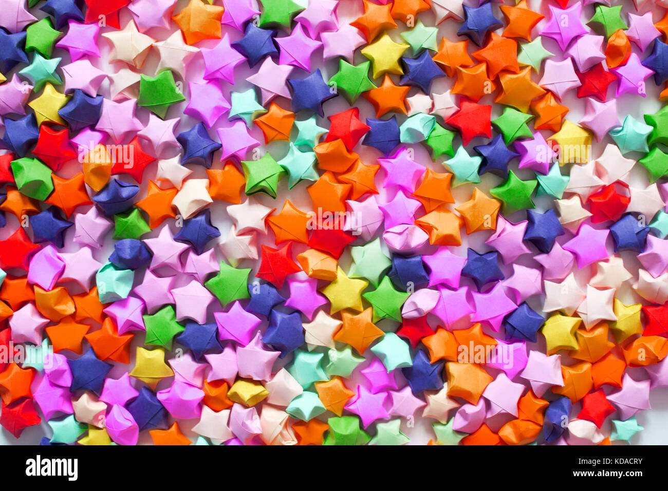 Origami stars background Stock Photo - Alamy