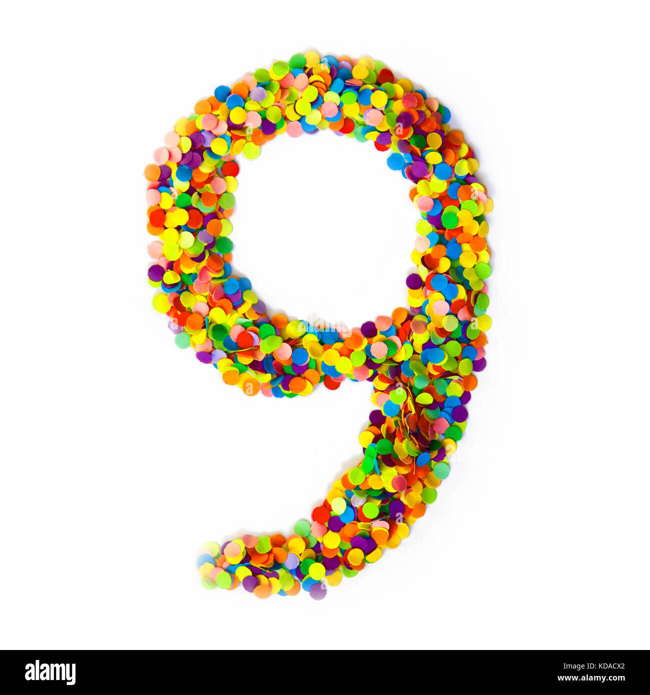 The number nine is lined with colored confetti. White background Stock ...