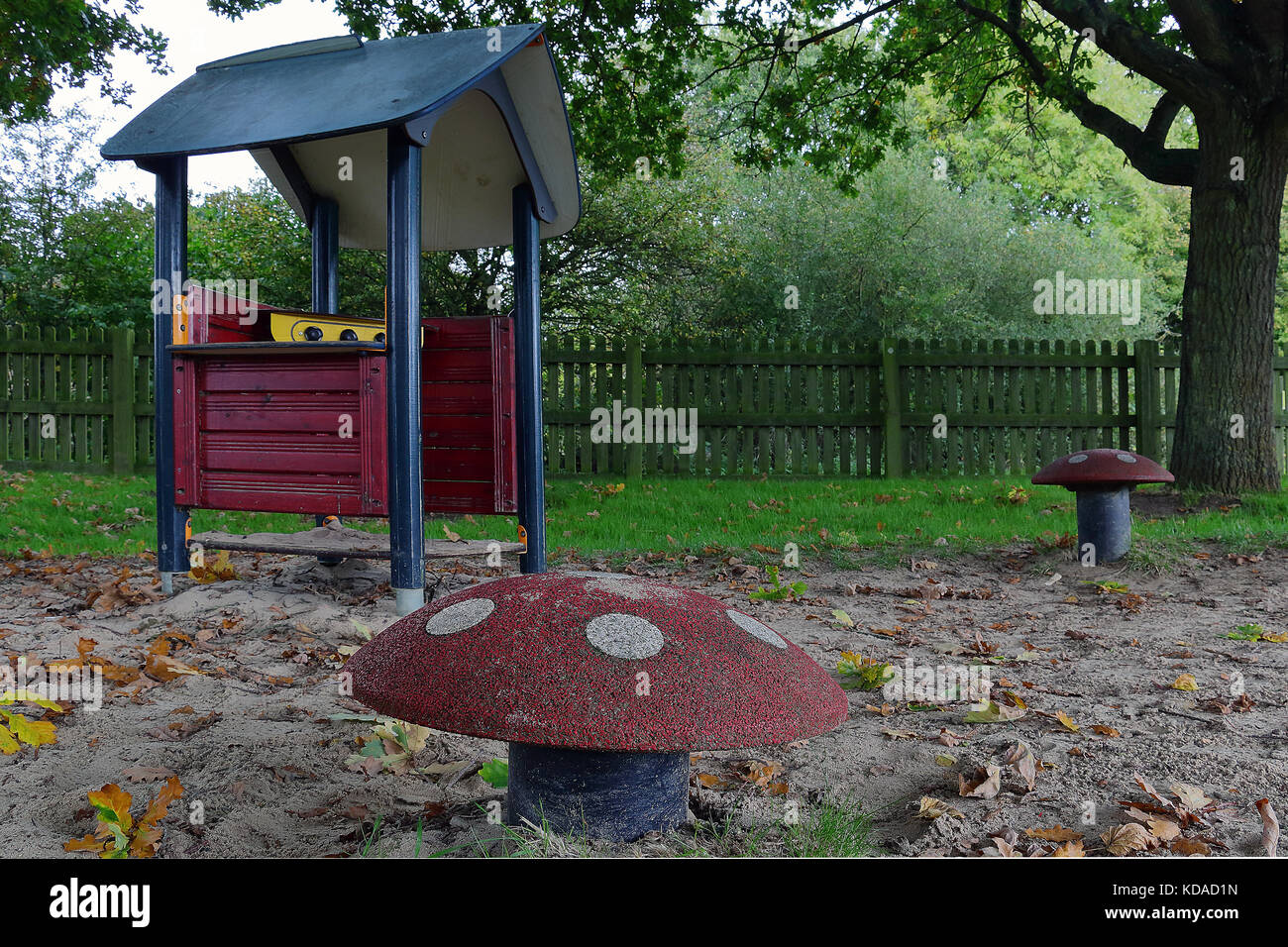 playground kitchen with toad stools around it Stock Photo - Alamy