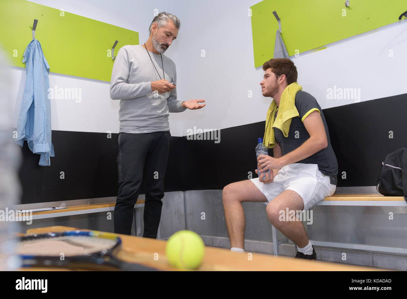 professional tennis trainer and coach in the locker room Stock Photo ...