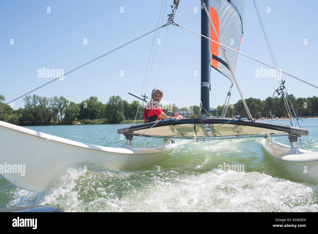 enjoying extreme sailing with racing sailboat Stock Photo - Alamy
