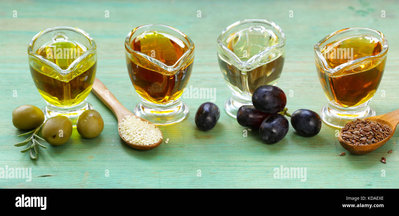 various types of vegetable oil - sesame, olive, linseed and grape seeds ...