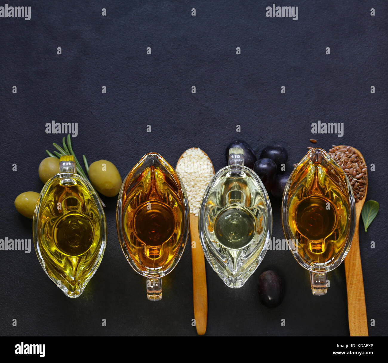 various types of vegetable oil - sesame, olive, linseed and grape seeds ...