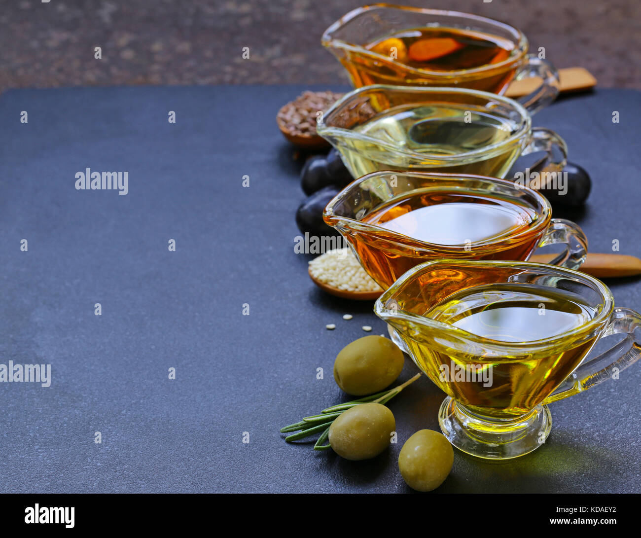 various types of vegetable oil - sesame, olive, linseed and grape seeds ...