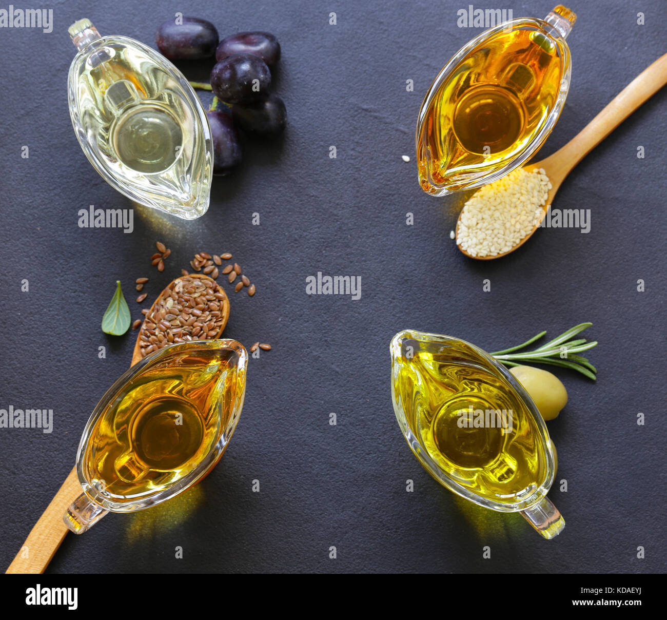 various types of vegetable oil - sesame, olive, linseed and grape seeds ...