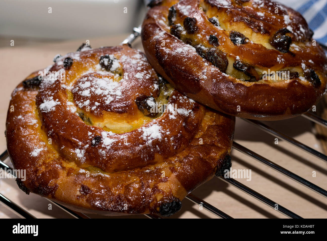 Home baked spiral cheese swirl with raisins hi-res stock photography ...