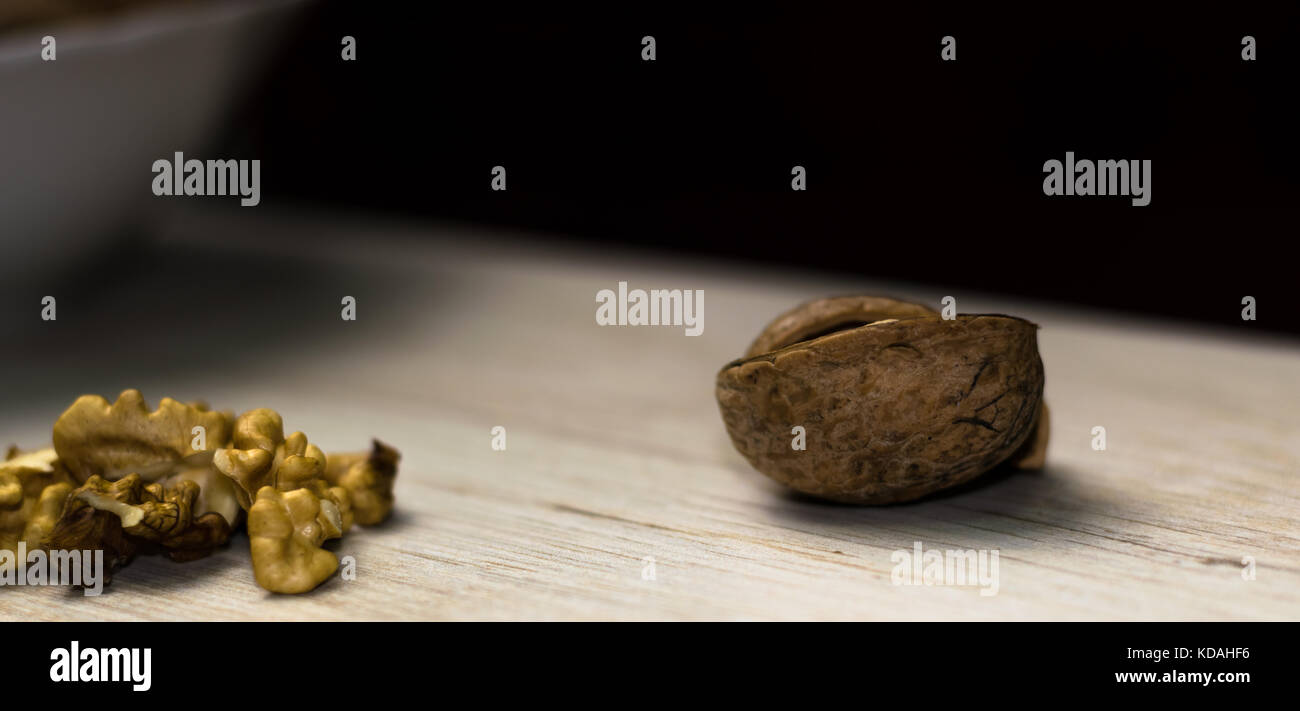 Raw walnuts composition close up side view Stock Photo - Alamy