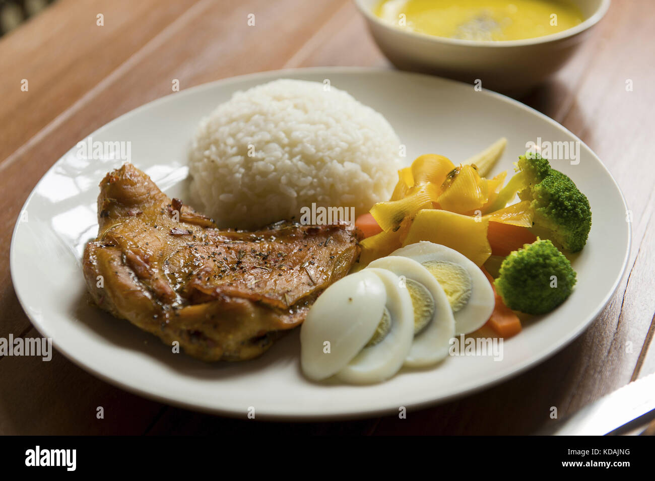 rosemary chicken leg rice Stock Photo - Alamy