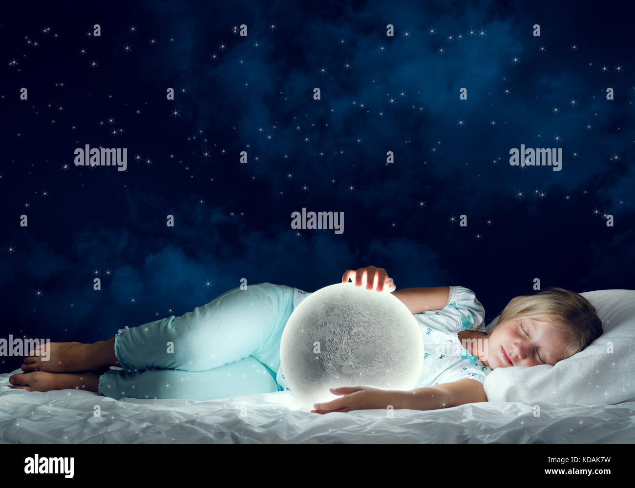 Girl in her bed and moon planet Stock Photo - Alamy
