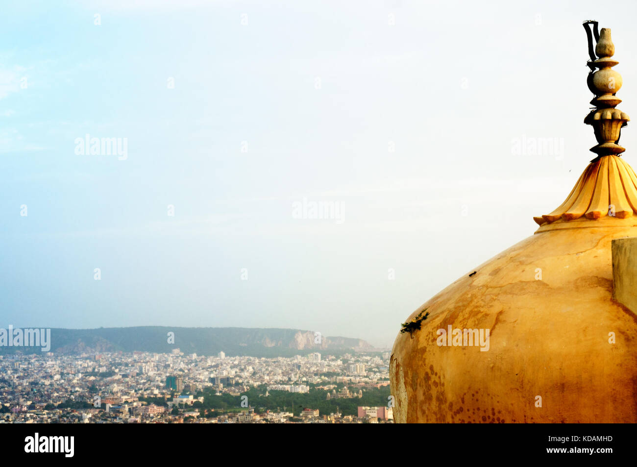 Dome & spires of an indian fort shot against a cityscape Stock Photo ...
