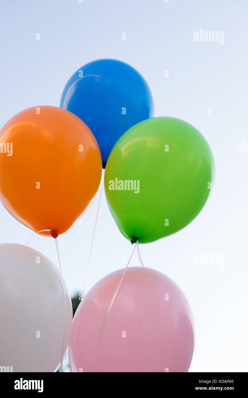 Bunch of multi coloured balloons Stock Photo - Alamy