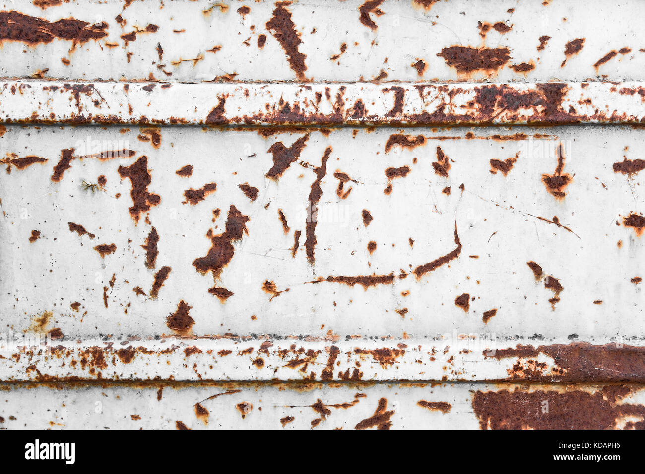 Detail of the old metal surface with sections of corrosion, rust and ...
