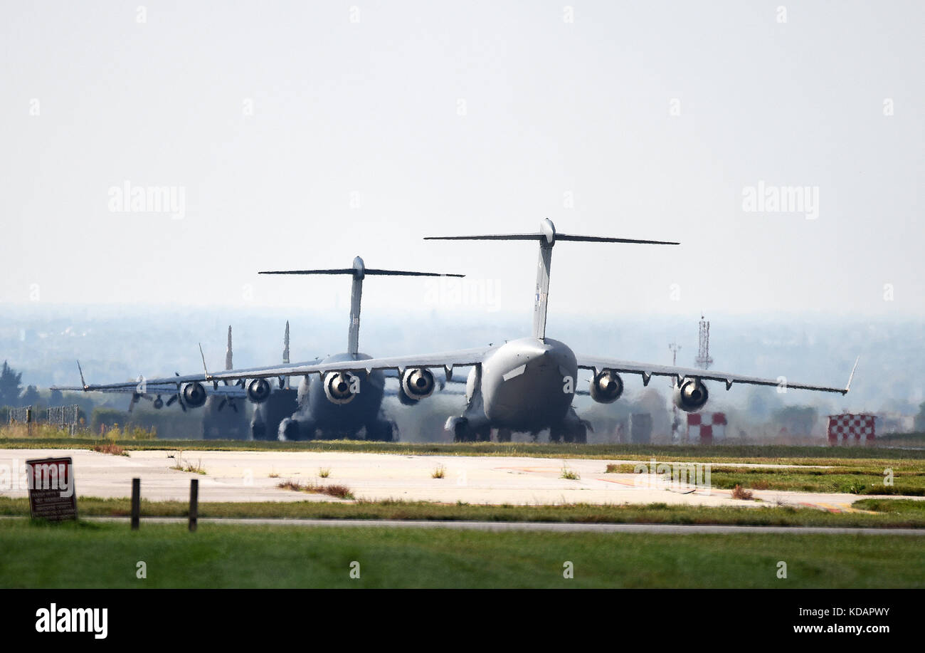 Two of five C-130 Hercules airplanes and two C17 Globemaster III ...