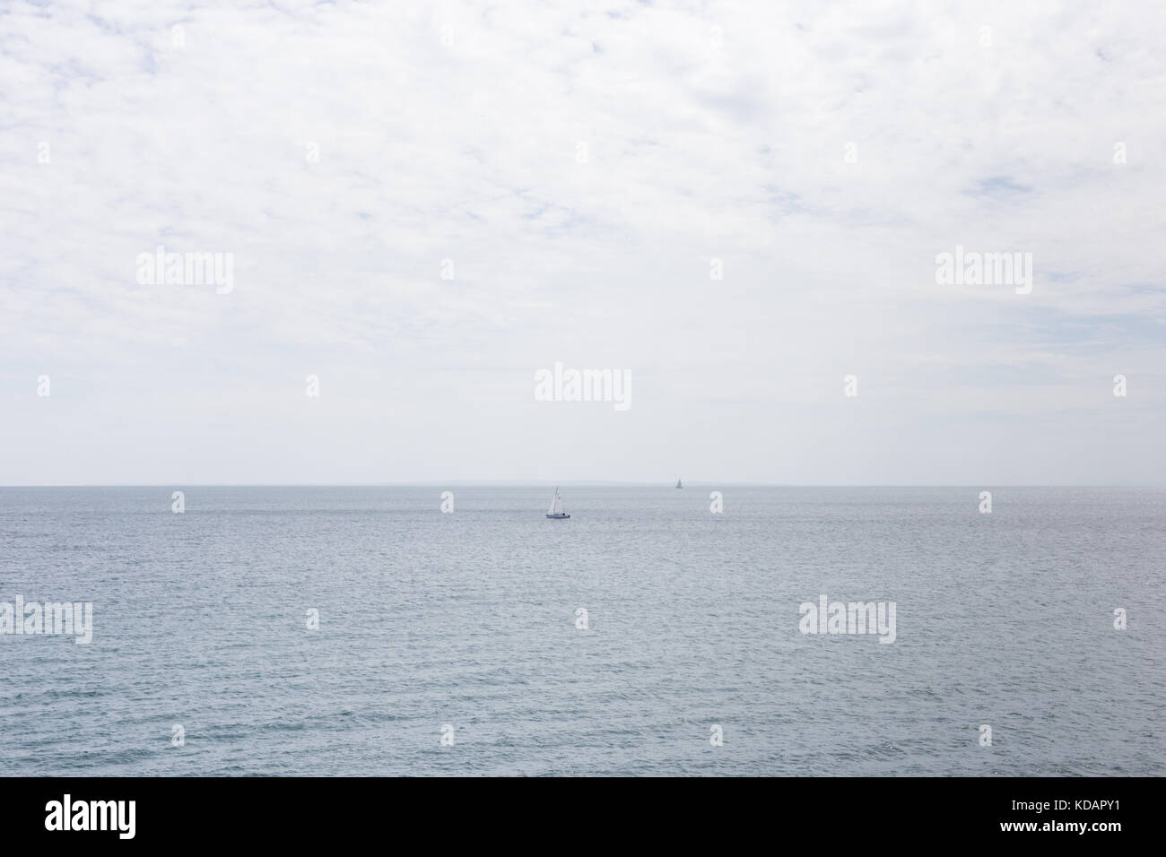 View of the ocean with ships near to the far horizon Stock Photo - Alamy
