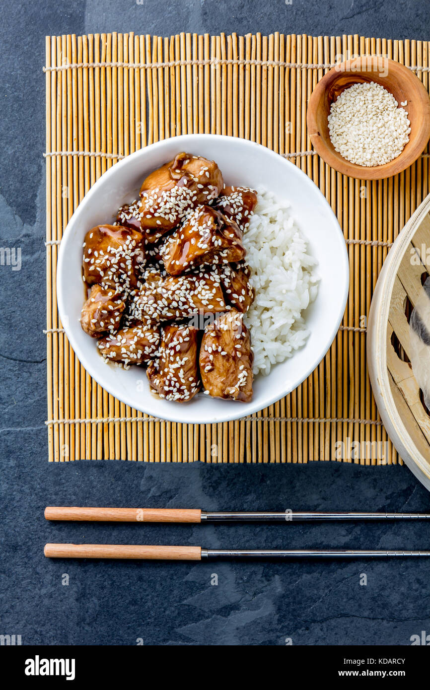 Japanese food. Chicken teriyaki with rice. slate background. Top view ...