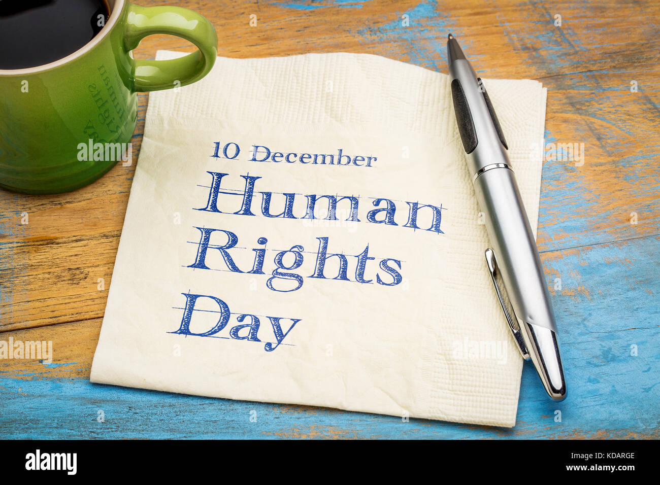 Human Rights Day (10 December) - handwriting on a napkin with a cup of ...