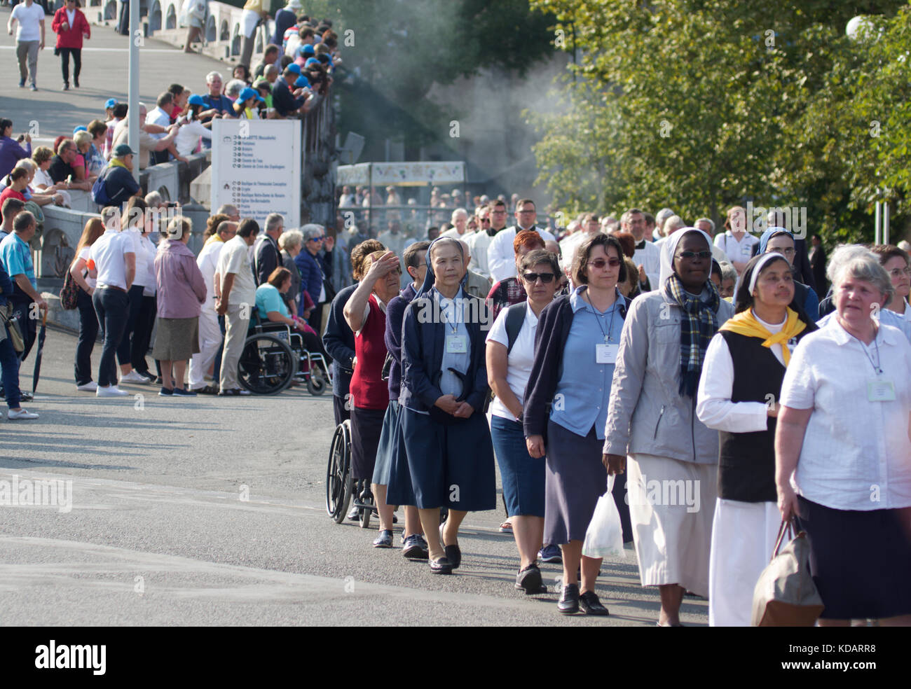 Procession of pilgrims and clergy at Lourdes, France Stock Photo - Alamy