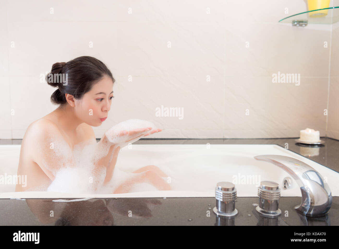 Asian woman in bubble bath hi-res stock photography and images - Alamy