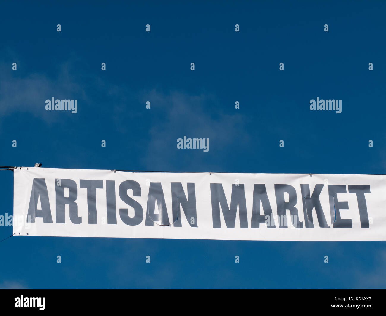 Artisan Market advertisement banner across street, organised by the ...
