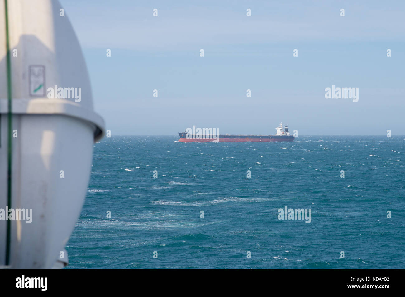 Merchant ship on the open sea Stock Photo - Alamy