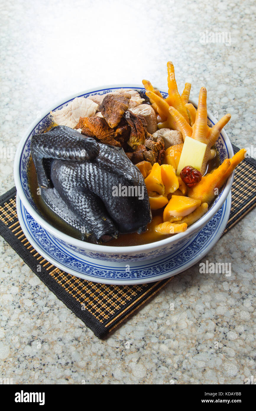 chinese chicken or seafood broth Stock Photo - Alamy