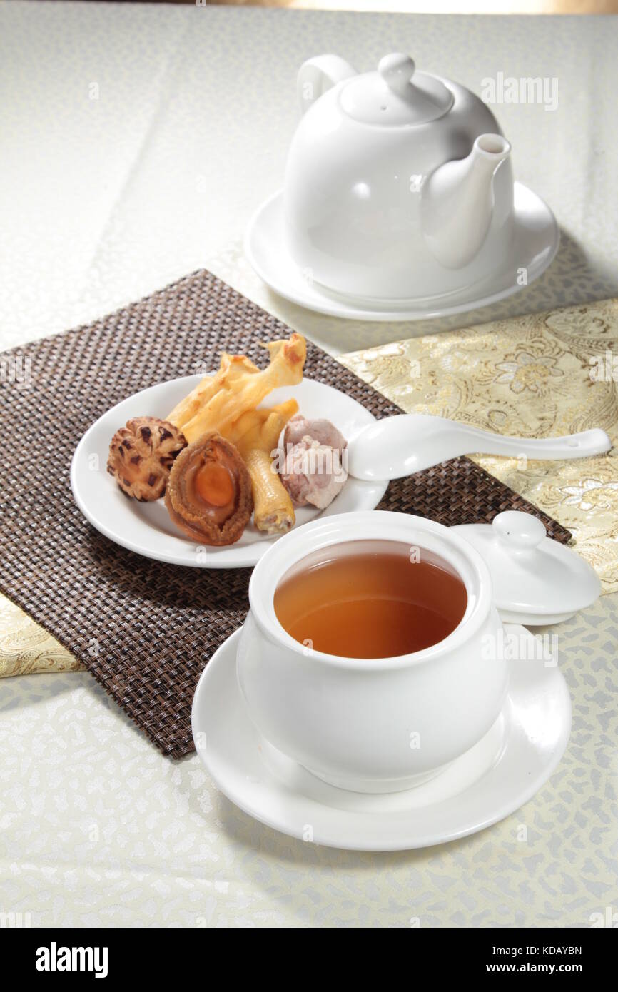 chinese chicken or seafood broth Stock Photo - Alamy